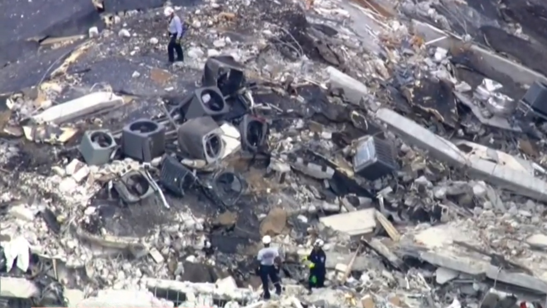 Watch CBS Evening News Rescuers scour rubble for condo collapse ...