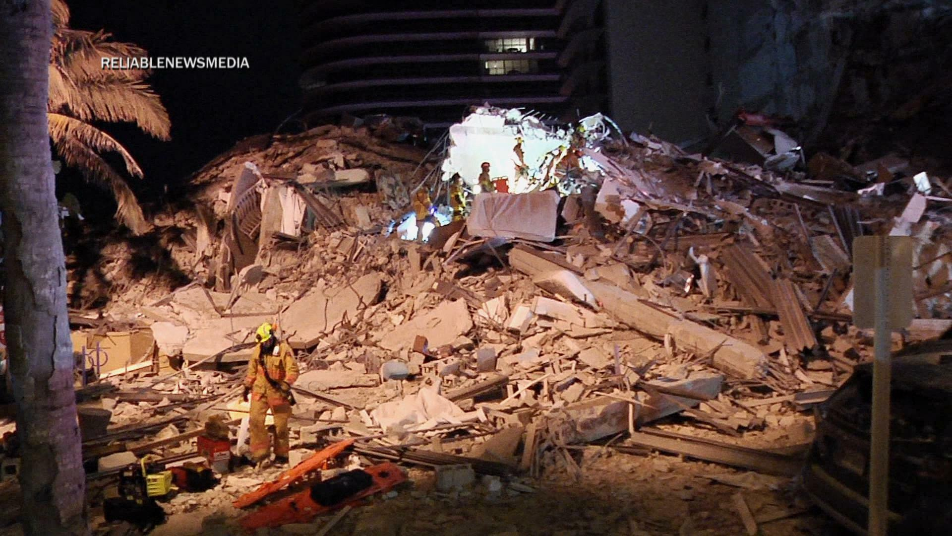 Watch CBSN News Specials: Rescue crews search condo collapse site ...