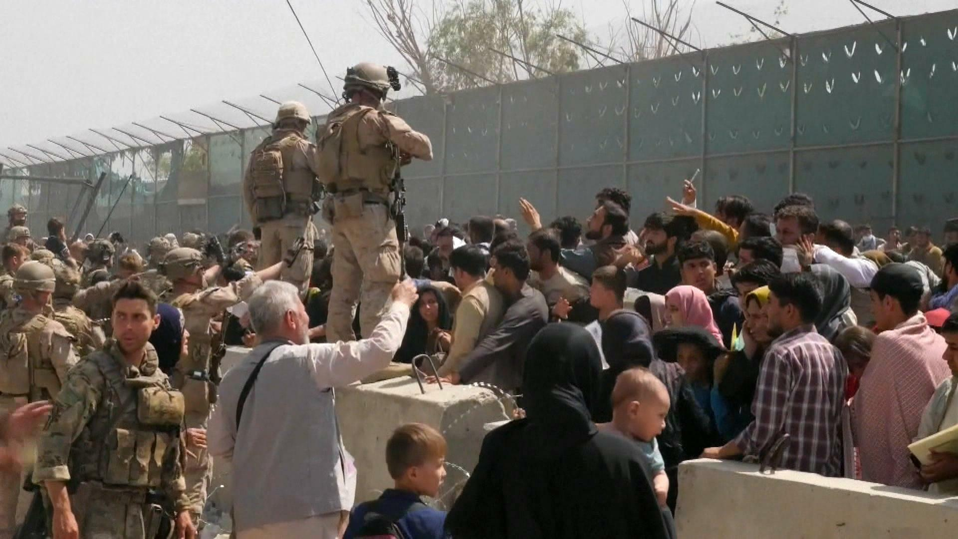 Watch CBS Evening News: Chaos continues at Kabul airport - Full show on CBS