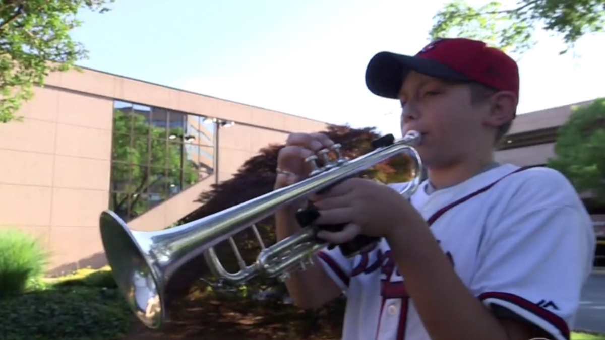 Watch CBS Evening News: Boy plays trumpet for front-line workers - Full ...