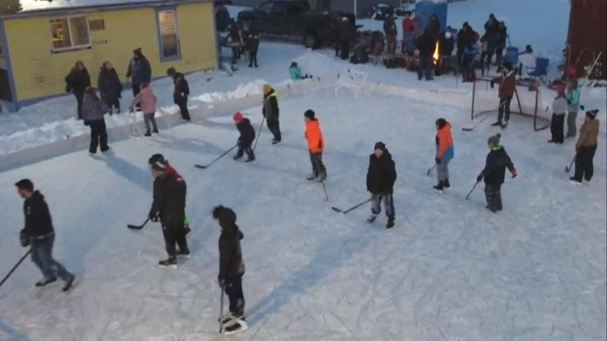 Watch CBS Evening News: Michigan neighbors build memories at ice rink ...