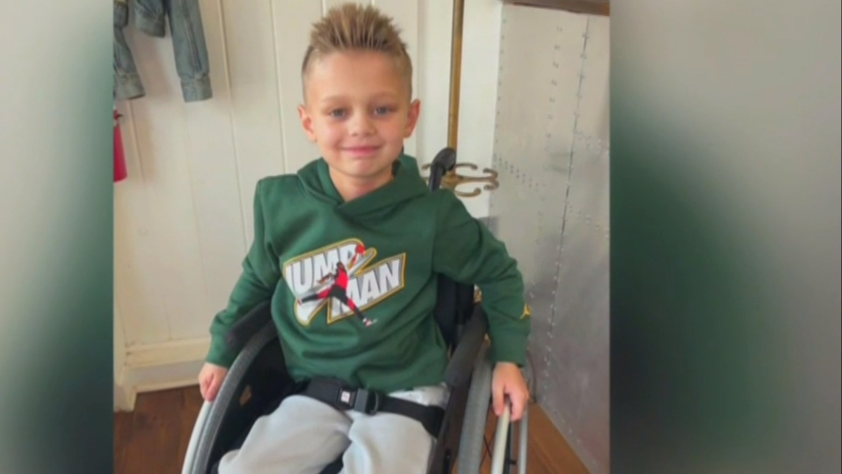 Watch CBS Evening News: Boy paralyzed in parade shooting returns home ...