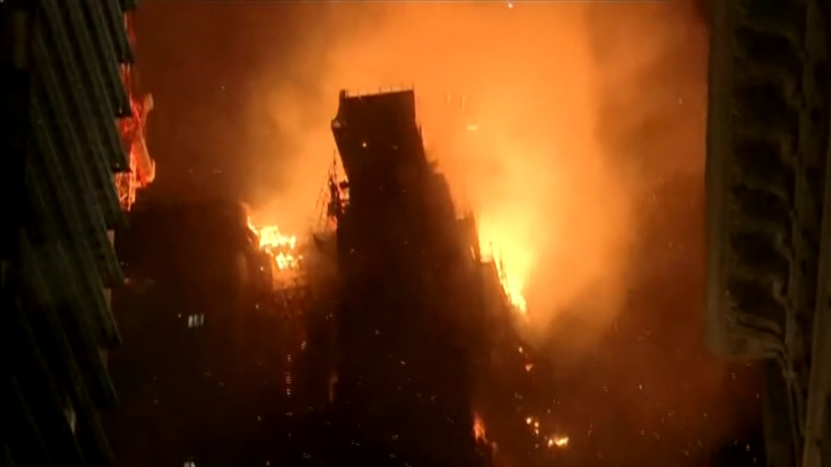 Watch CBS Evening News: Massive fire rips through Hong Kong skyscraper ...