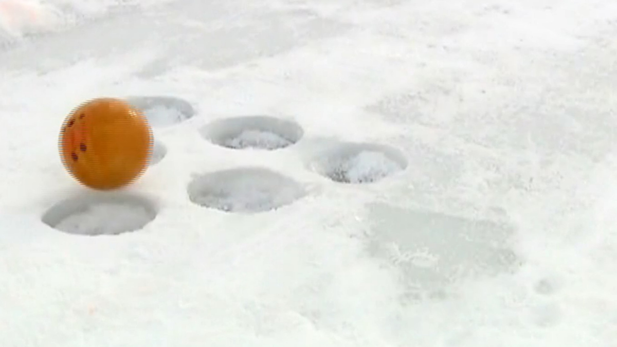 Watch CBS Evening News: Small Minnesota town enjoys winter ice bowling ...