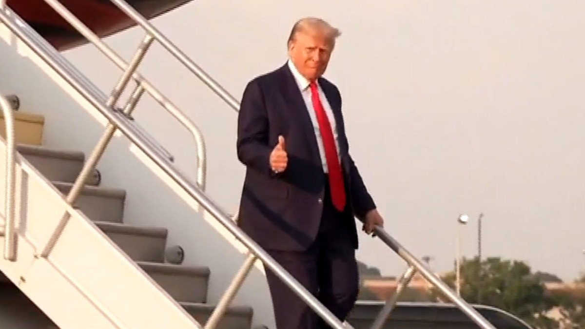 Watch CBS Evening News: 19 defendants surrender in Georgia election ...