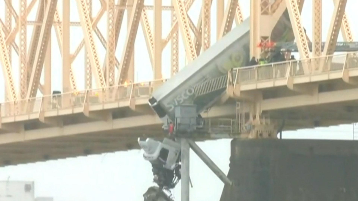 Watch CBS Evening News: Driver rescued as truck dangles off bridge ...