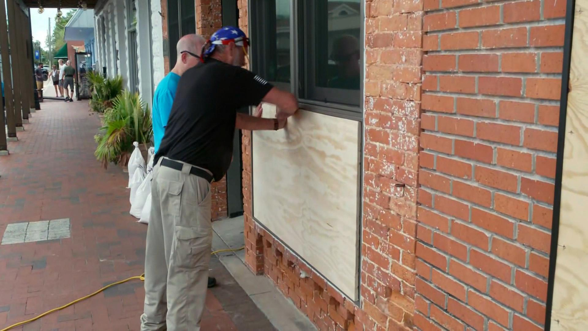 Watch CBS Evening News: Businesses, residents, hospitals brace for ...