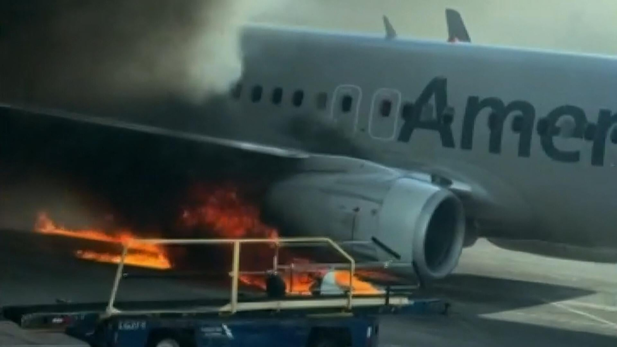 Watch CBS Evening News: Plane catches fire on tarmac of Denver airport ...