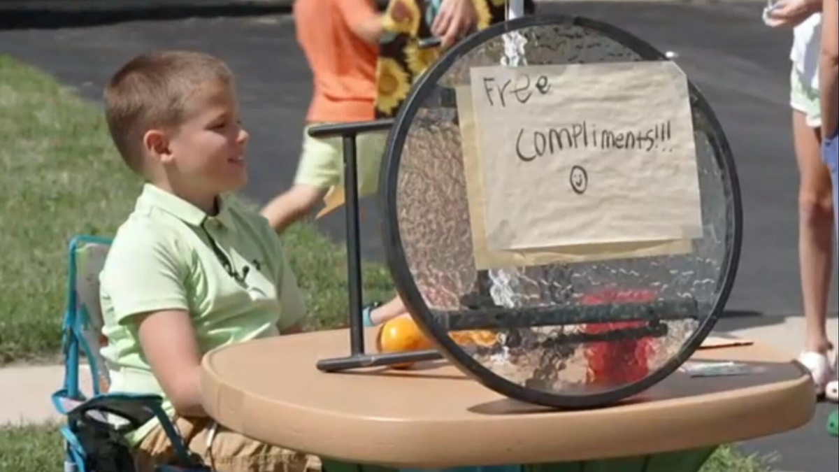 Watch CBS Evening News: 9-year-old boy opens a "compliment stand ...