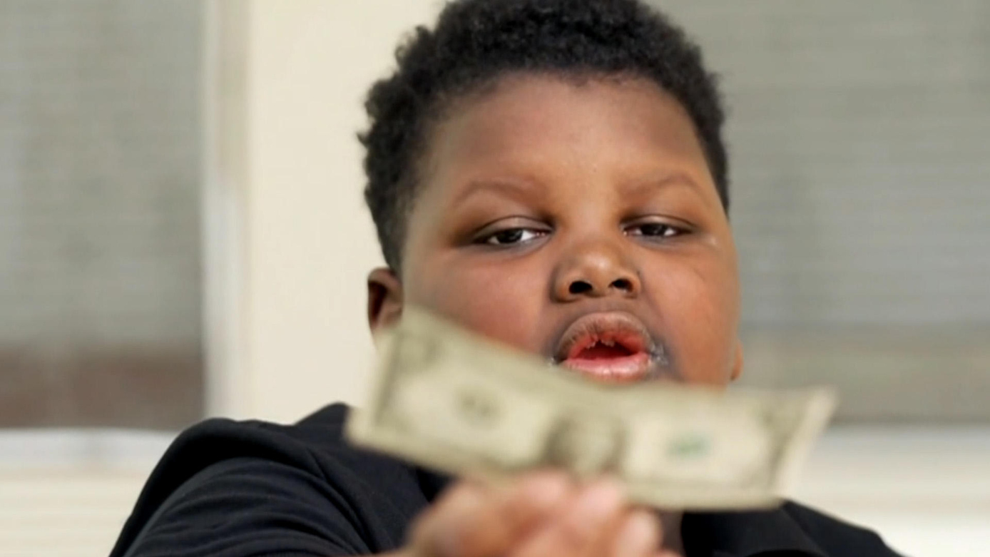 Watch CBS Evening News: Boy rewarded after giving away his only dollar ...