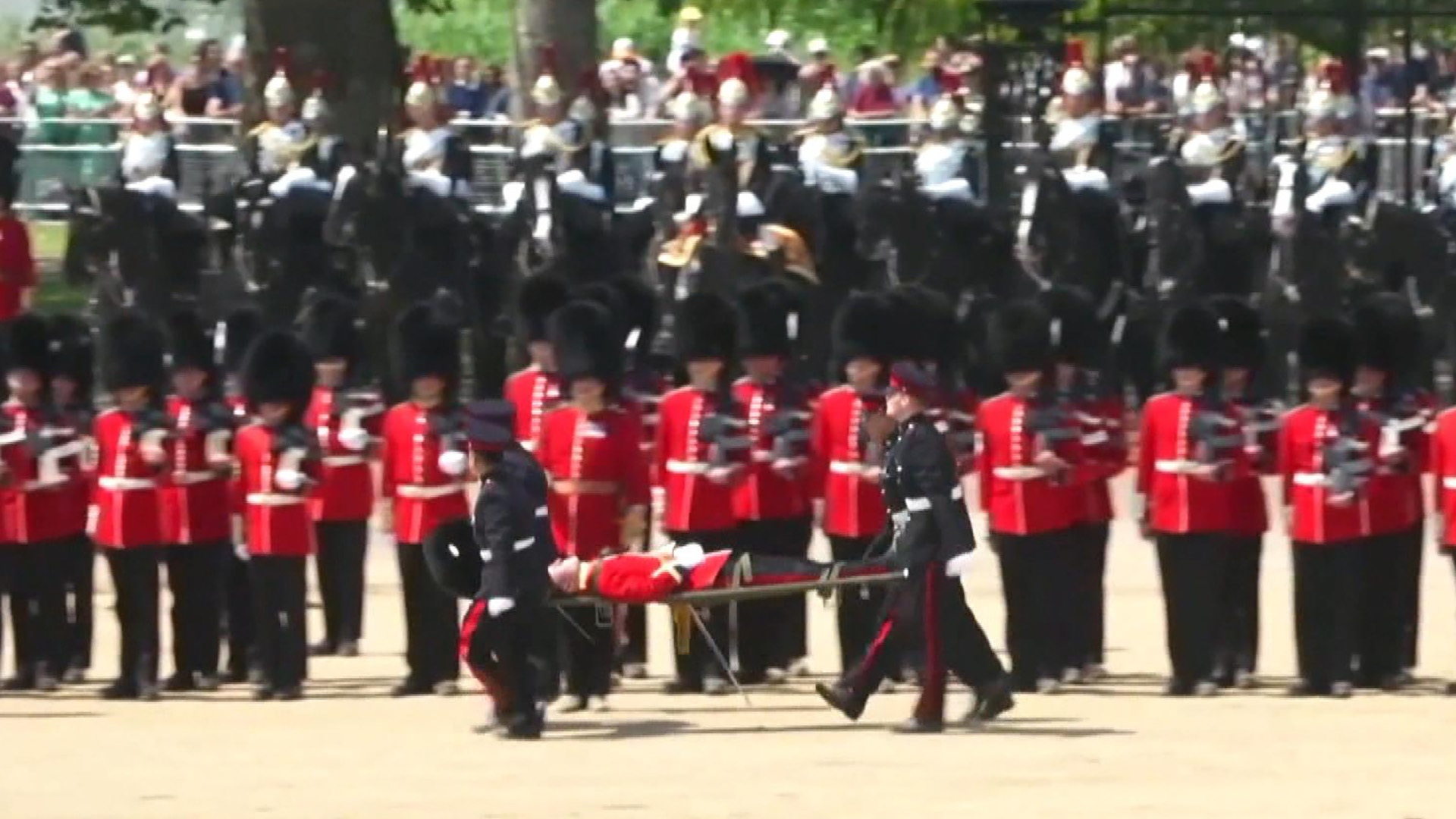 Watch CBS Evening News British royal guards collapse in spring heat ...