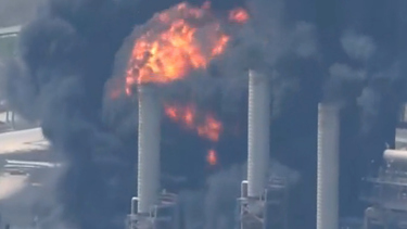 Watch CBS Evening News: Large fire erupts at oil refinery near Houston ...